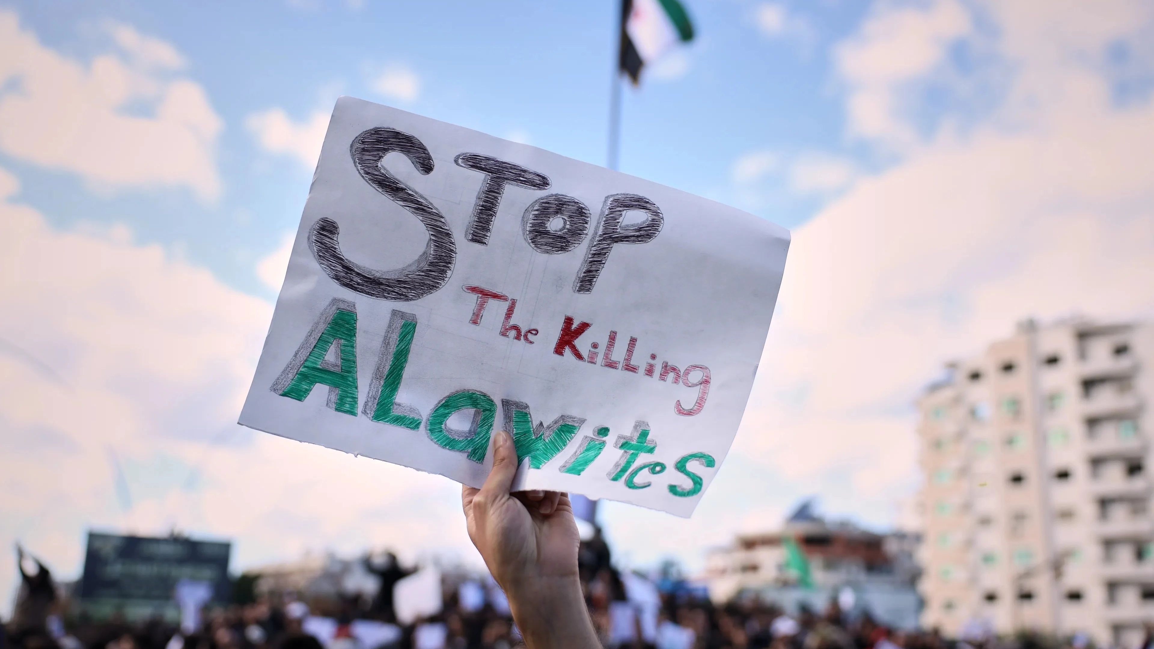 Syrian govt forces, supporters attack Alawite protesters calling for ...